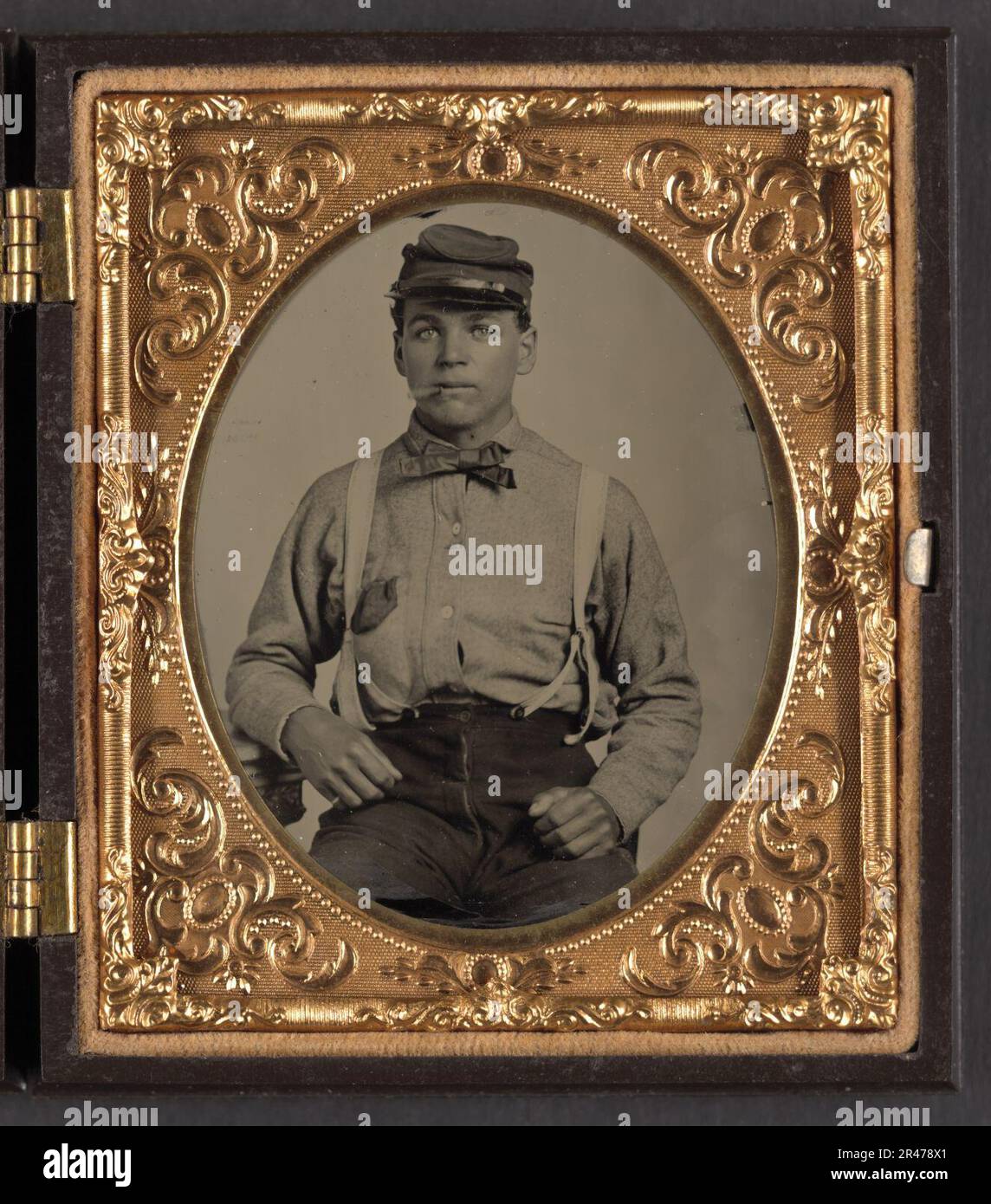 Unidentified soldier in uniform smoking a cigar Stock Photo - Alamy