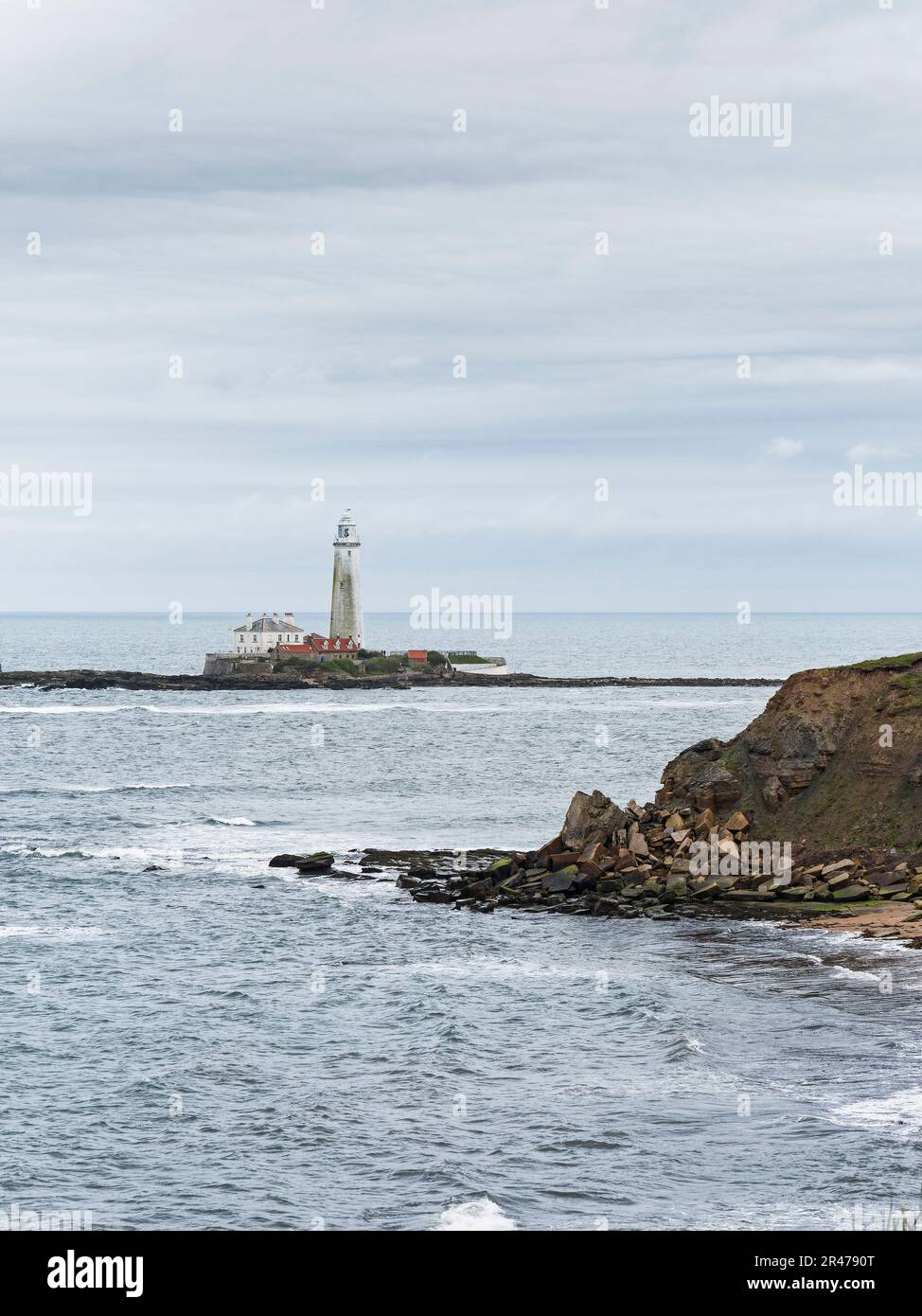 St Marys Island and lighthouse at Whitley Bay, North Tyneside, UK with ...