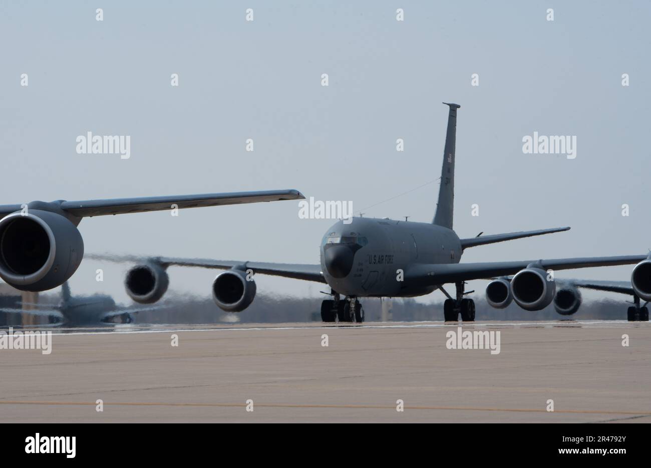 Multiple KC-135 Stratotankers taxi on a runway for an elephant walk ...