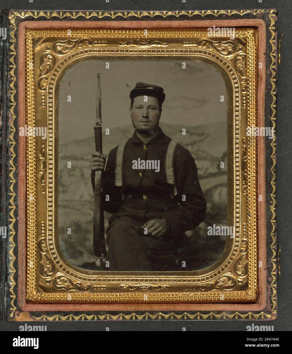 Unidentified soldier in Union uniform with carbine in front of painted ...