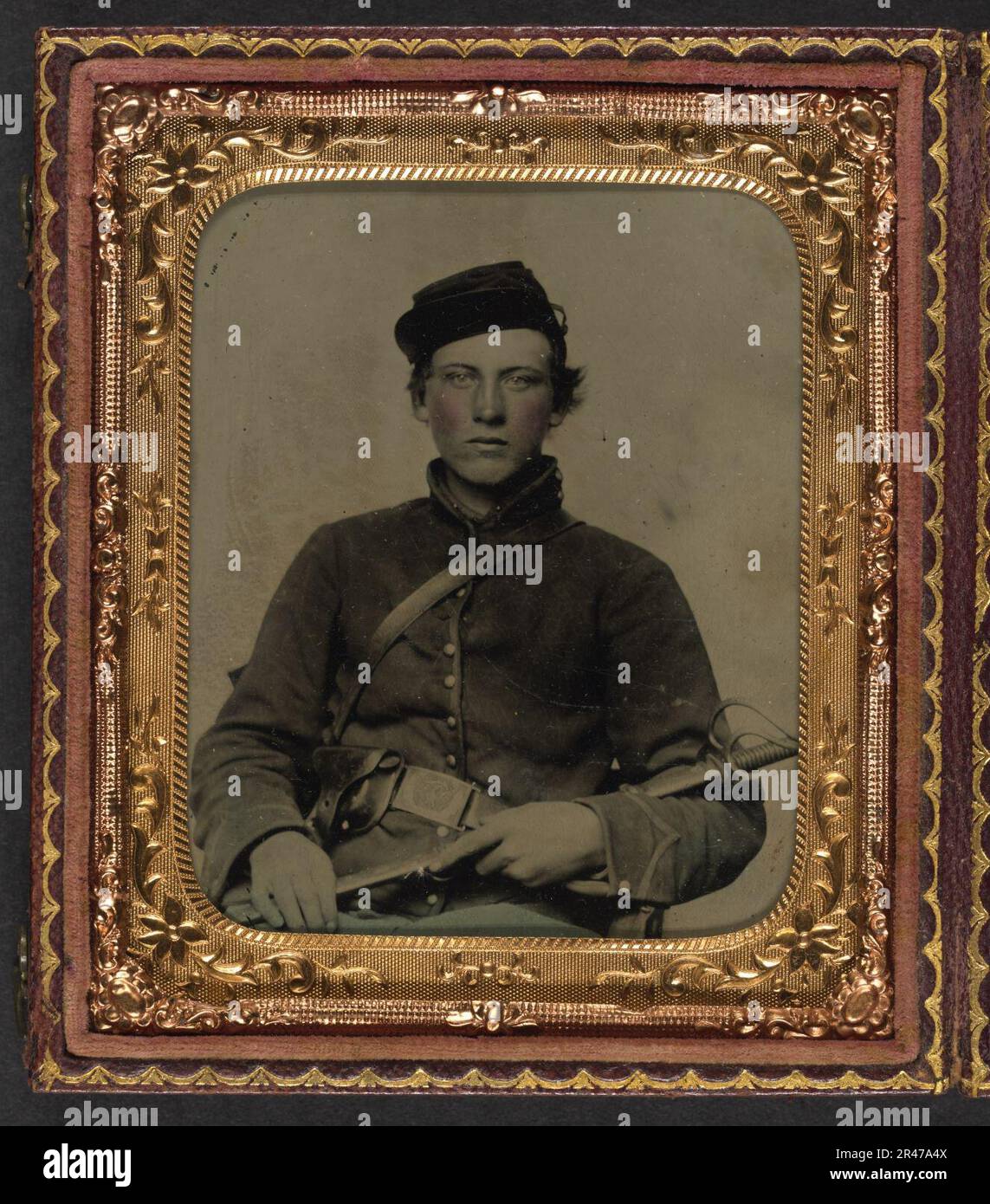 Unidentified soldier in Union uniform with cavalry saber and cap box ...