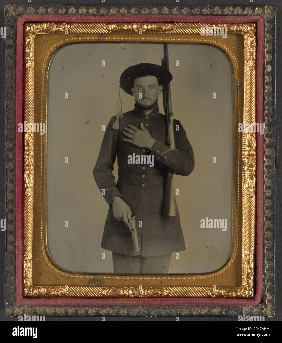 Unidentified soldier in Union uniform with rifle and pistol, standing ...