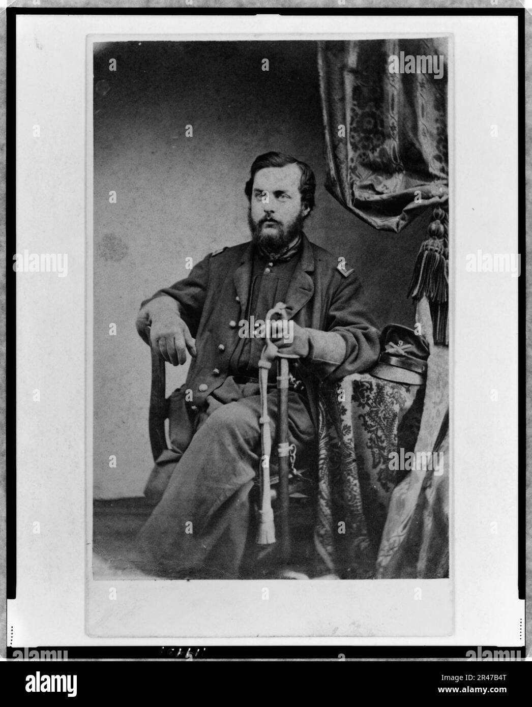 Unidentified Union officer, three-quarter length, seated, with left ...