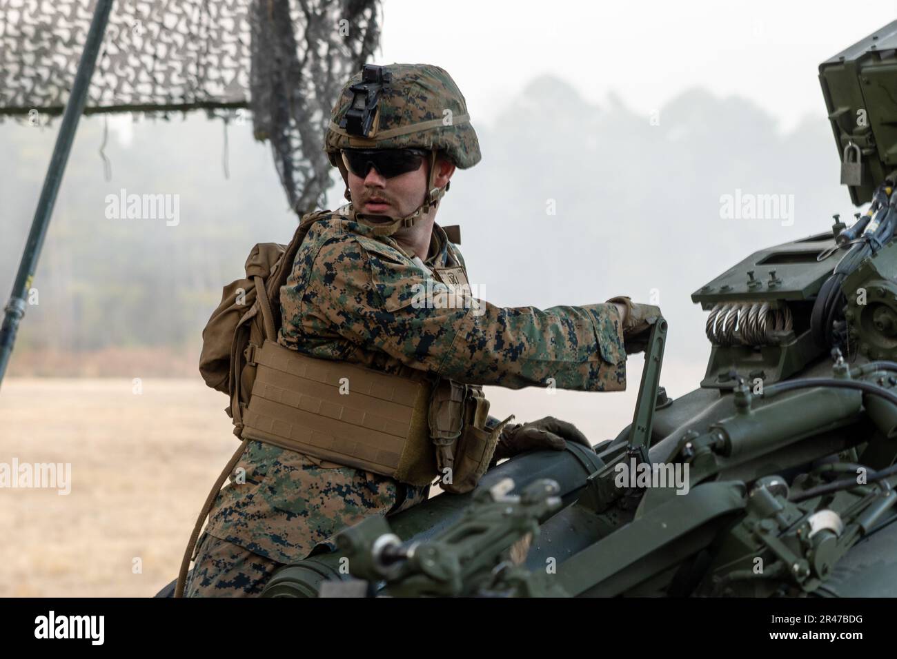U.S. Marine Corps Pvt. Alex Freeman, a cannoneer with 10th Marine ...