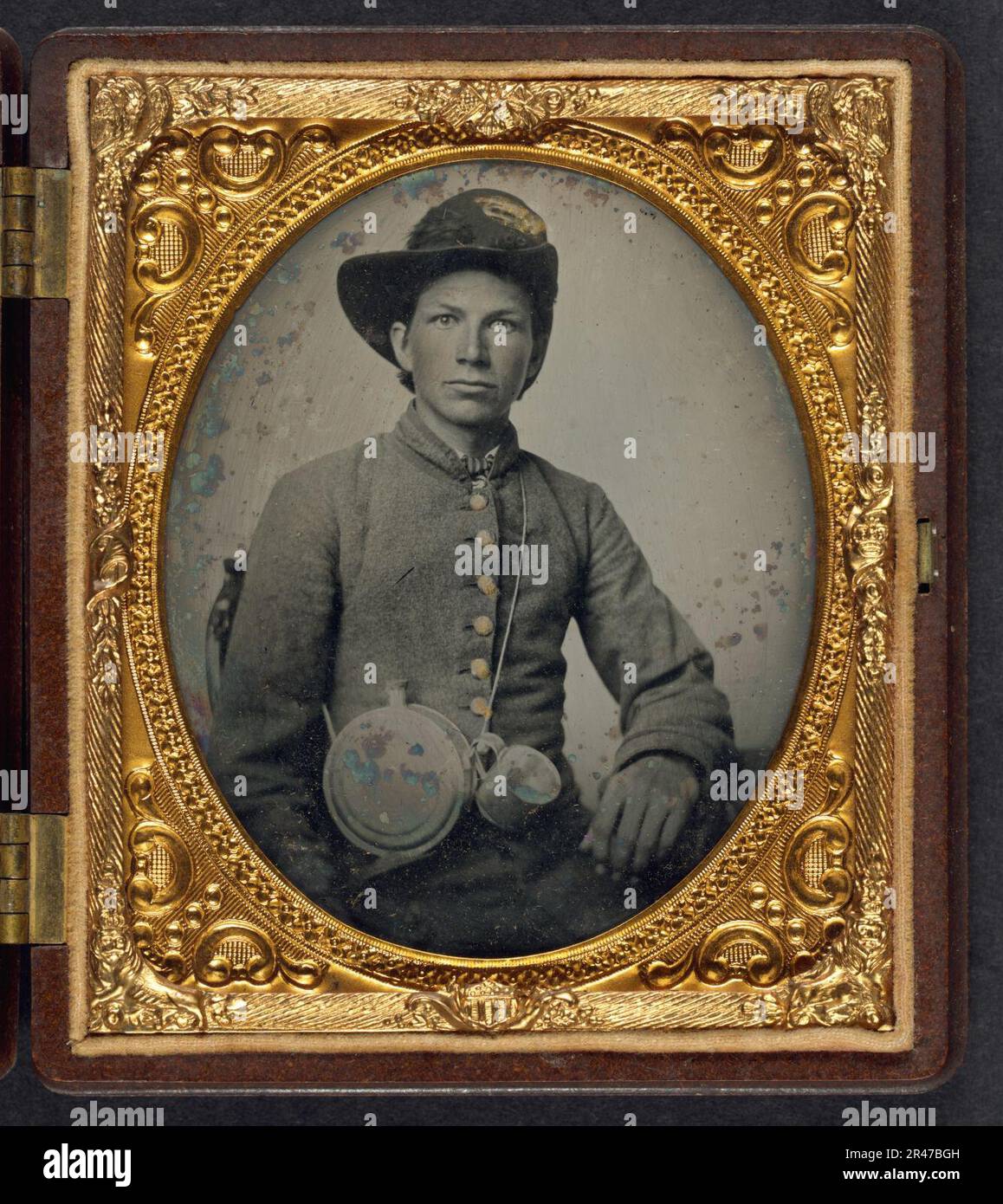 Unidentified young soldier in Confederate shell jacket, Hardee hat with ...