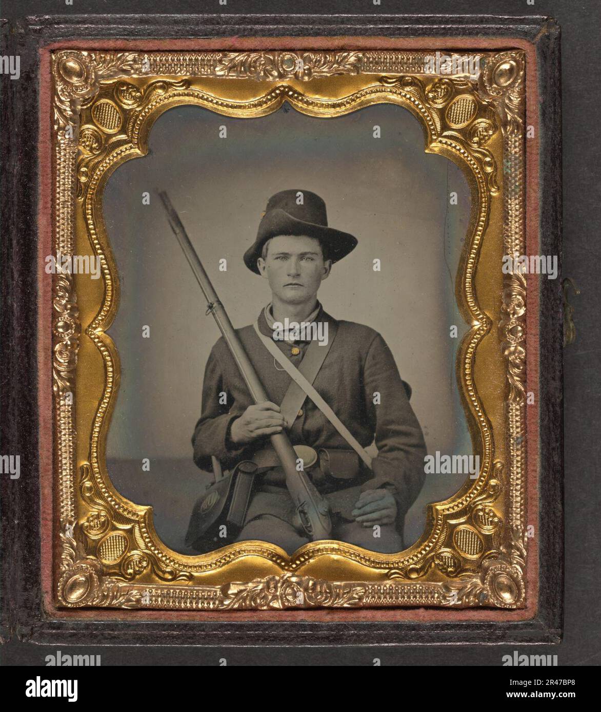 Unidentified young soldier in Union uniform and Hardee hat sitting with ...