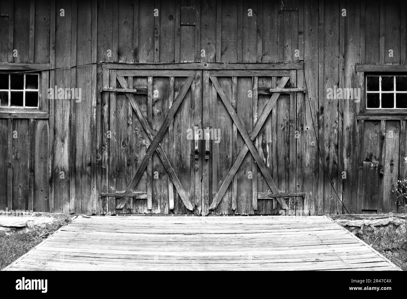 A classic, vintage style barn with two large doors and rectangular ...