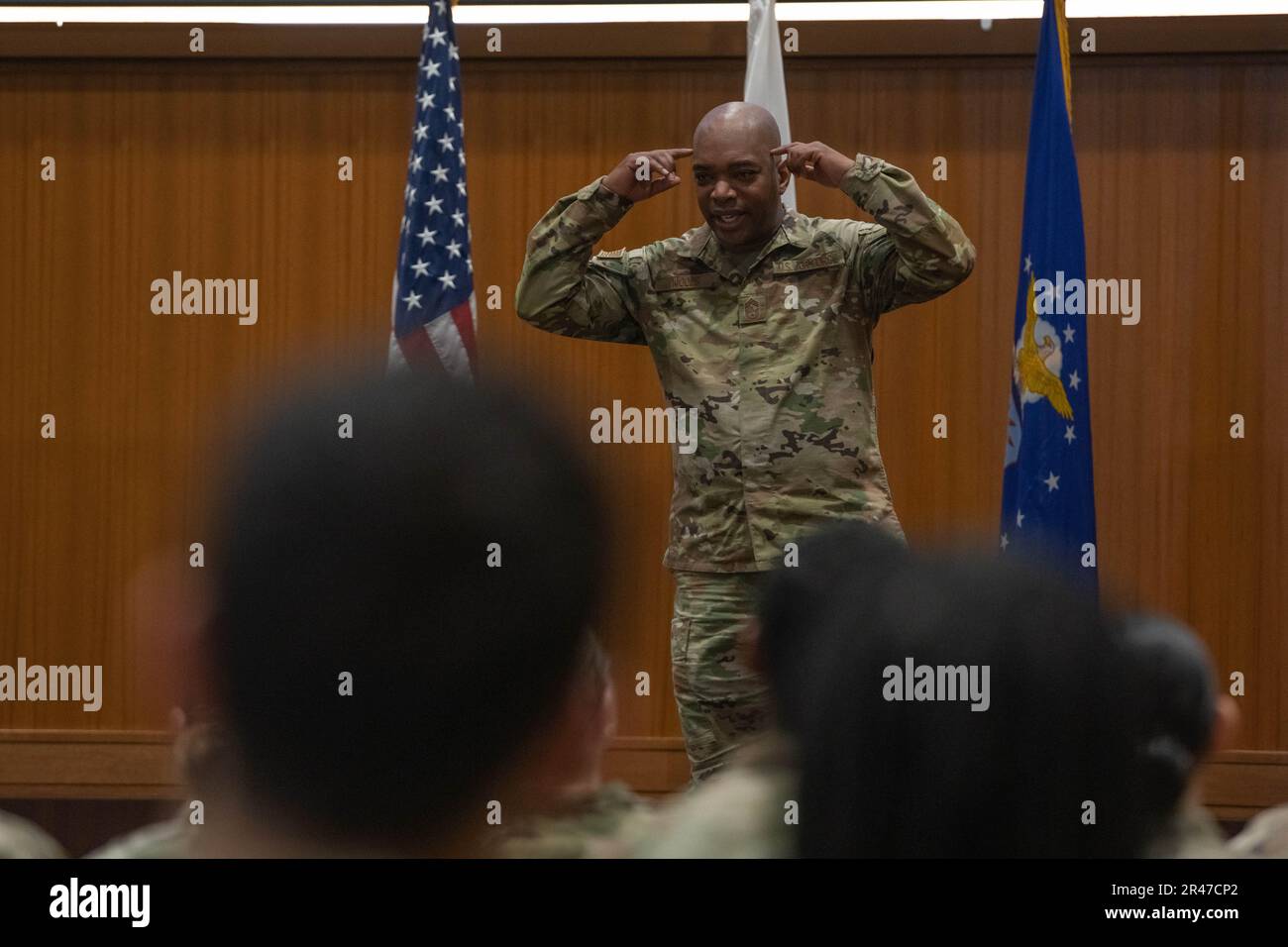 Chief Master Sgt. Ronnie Woods, 18th Wing command chief, gives advice ...