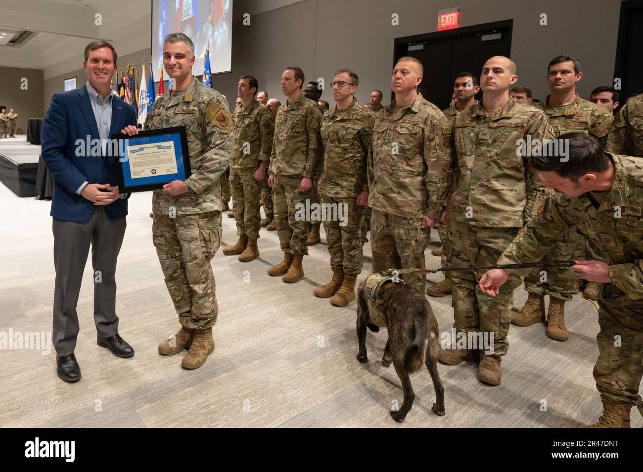 Gov. Andy Beshear, left, presents the Kentucky Governor’s Outstanding ...