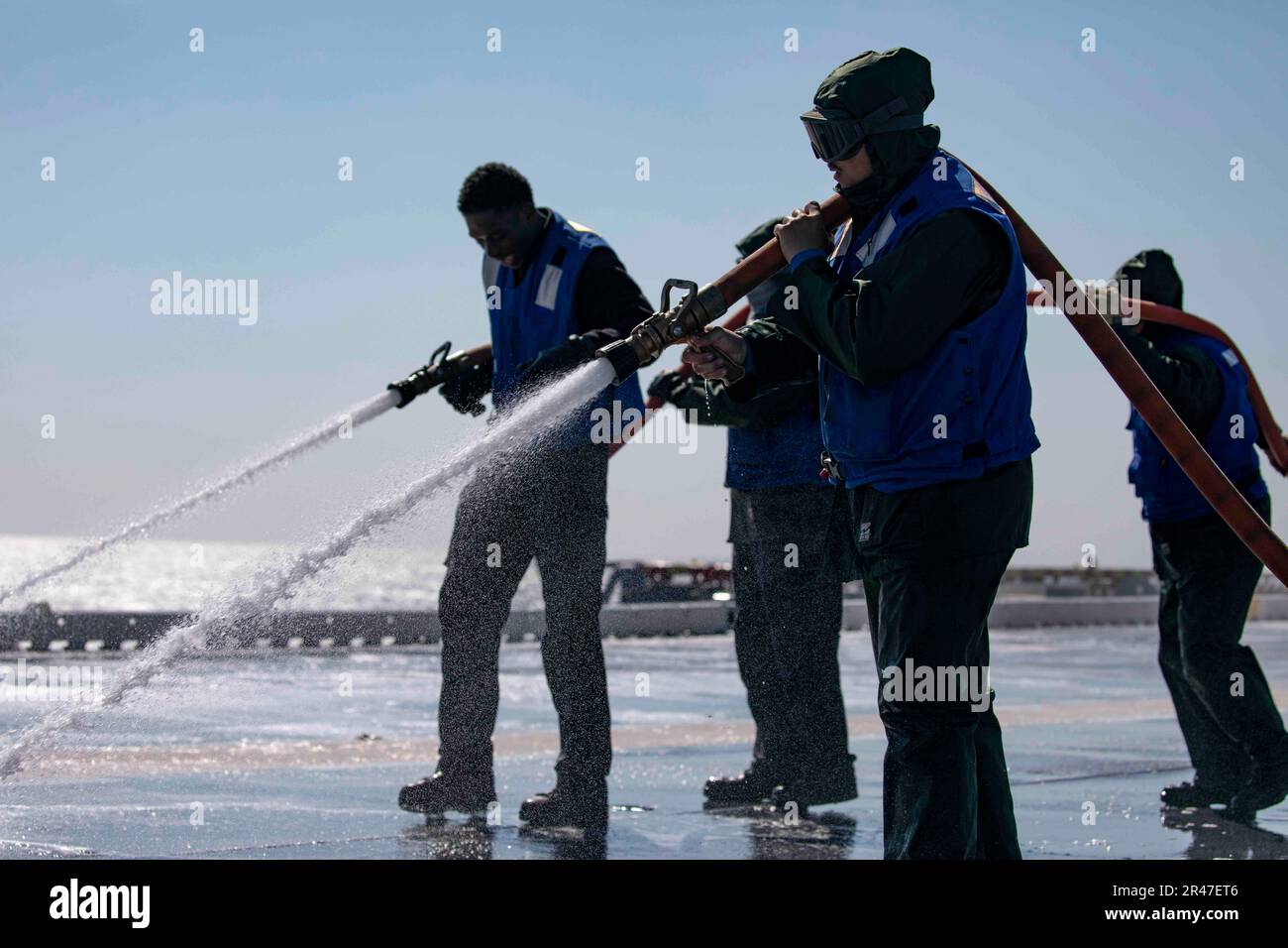 230330-N-OX029-2065 ATLANTIC OCEAN (March 30, 2023) Sailors wash ...