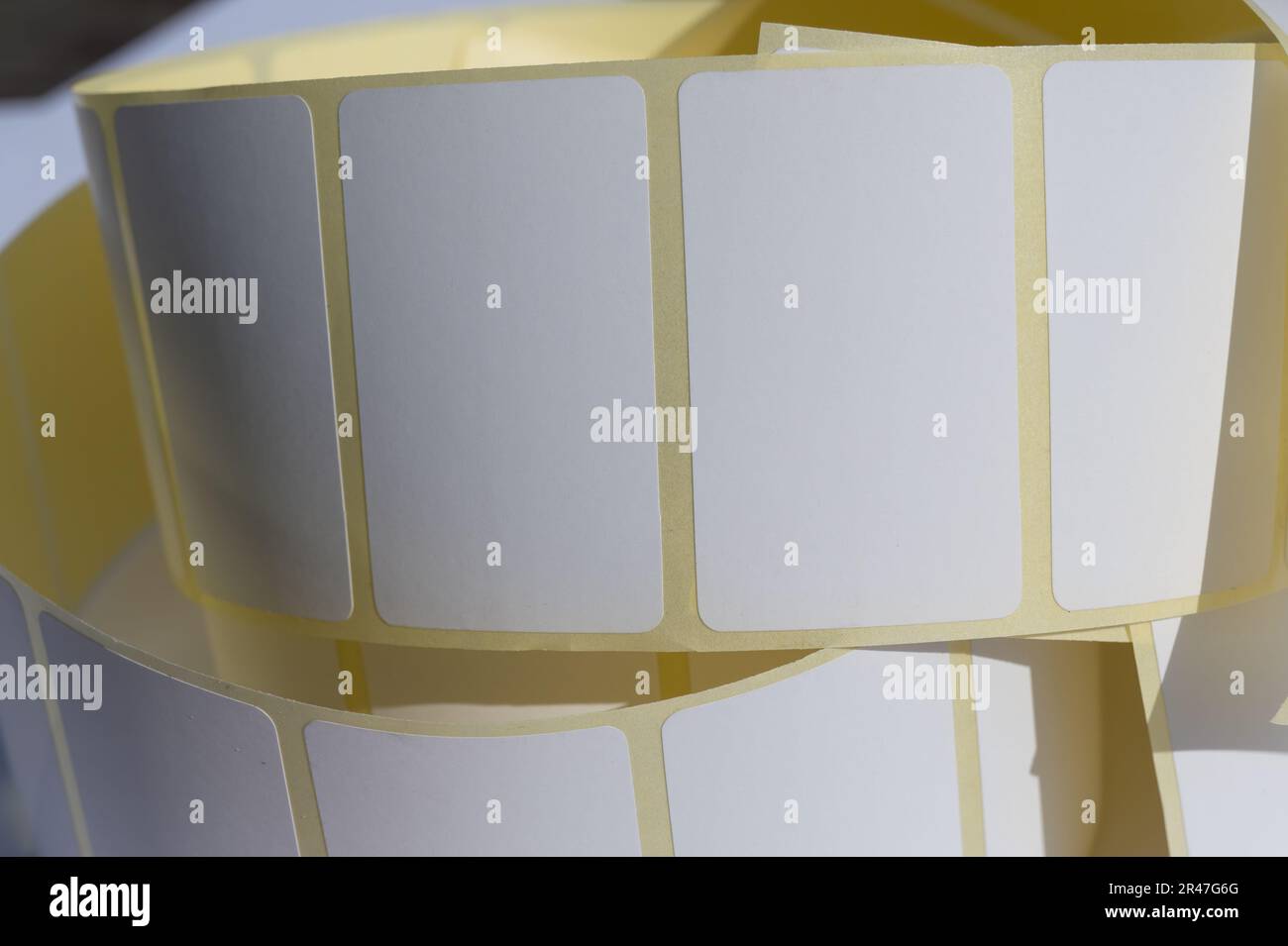 Rolls of white labels isolated. Labels for direct thermal or thermal ...