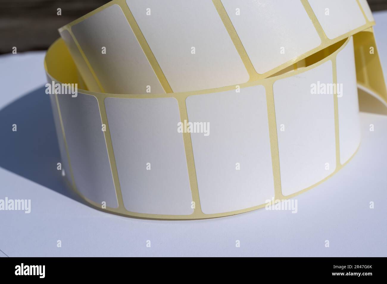 Rolls of white labels isolated. Labels for direct thermal or thermal ...