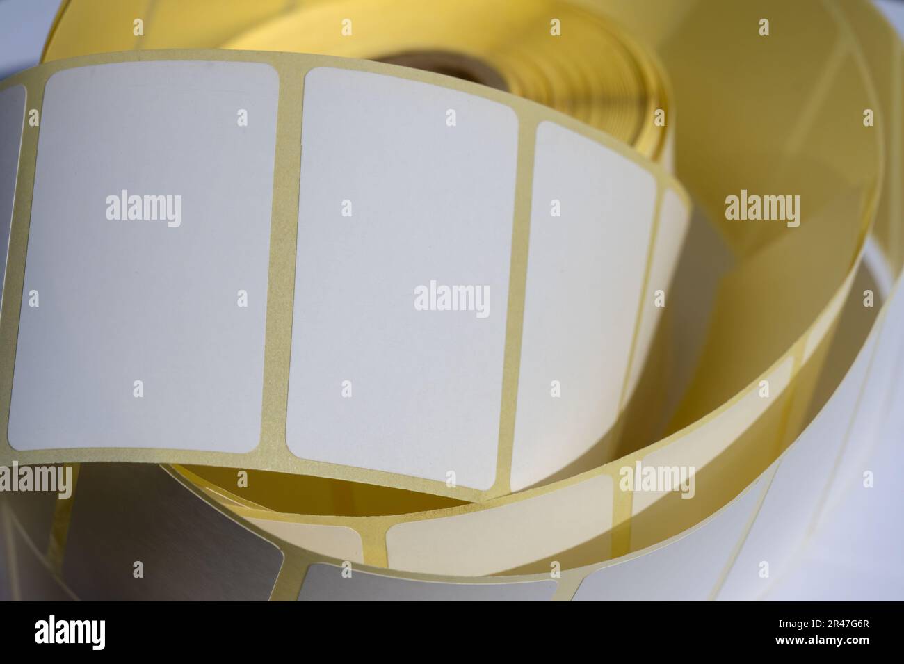 Rolls of white labels isolated. Labels for direct thermal or thermal ...