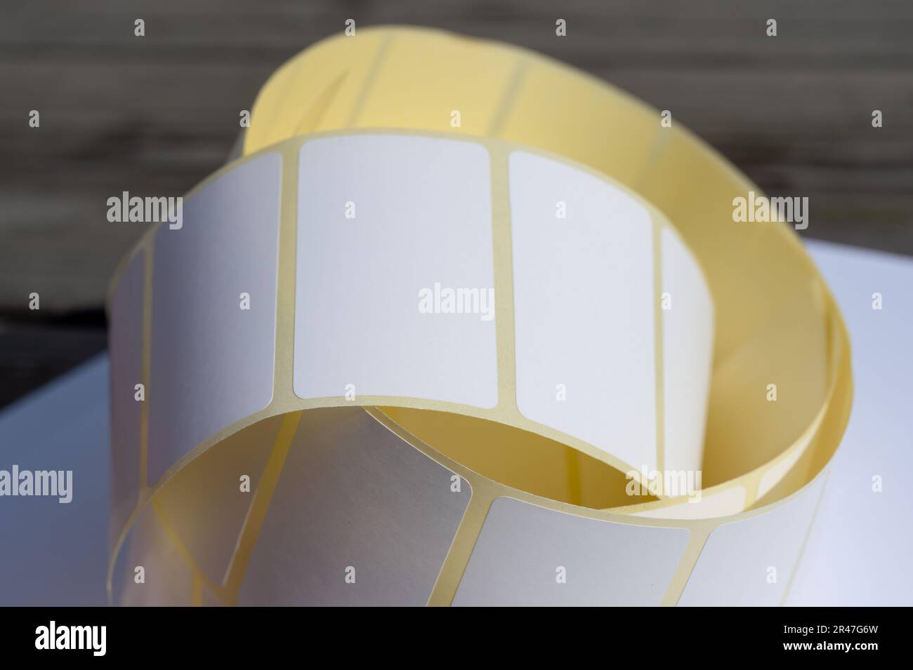 Rolls of white labels isolated. Labels for direct thermal or thermal ...