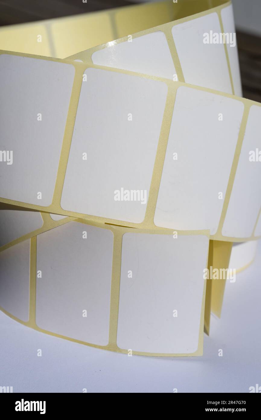Rolls of white labels isolated. Labels for direct thermal or thermal ...