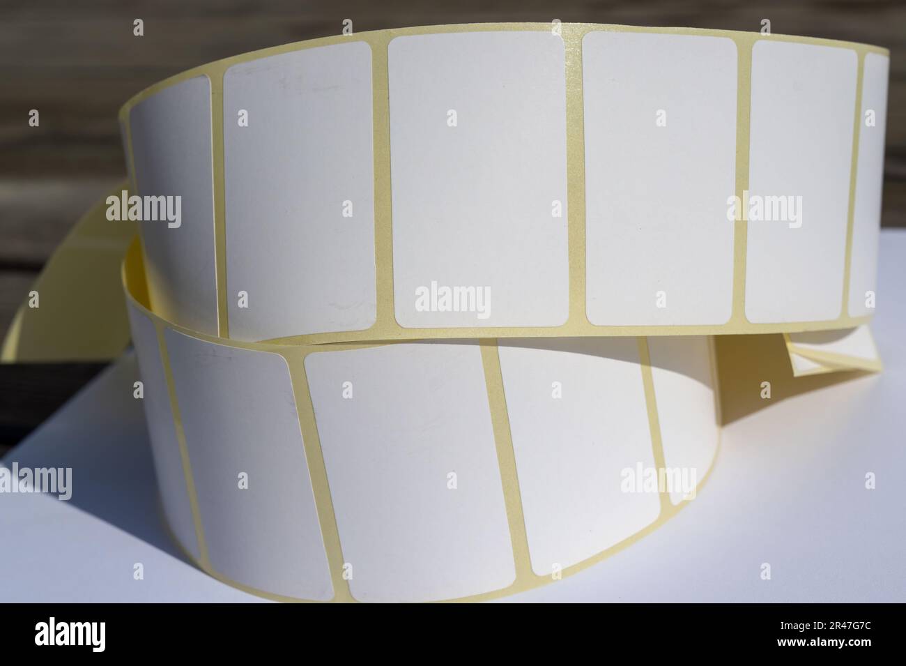 Rolls of white labels isolated. Labels for direct thermal or thermal ...