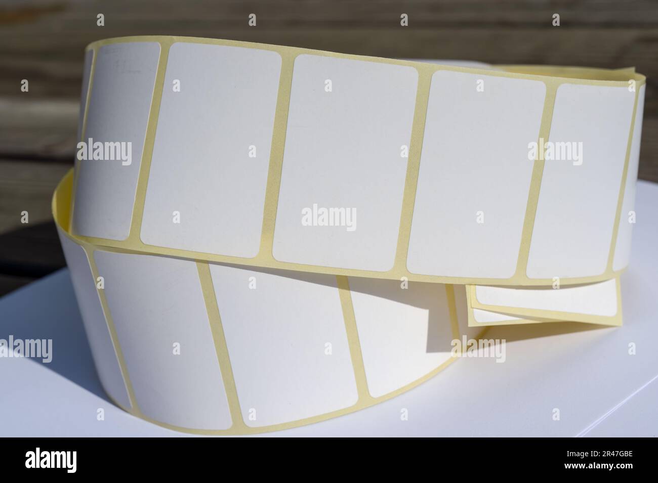 Rolls of white labels isolated. Labels for direct thermal or thermal ...