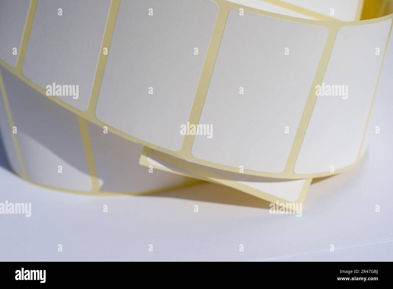 Rolls of white labels isolated. Labels for direct thermal or thermal ...