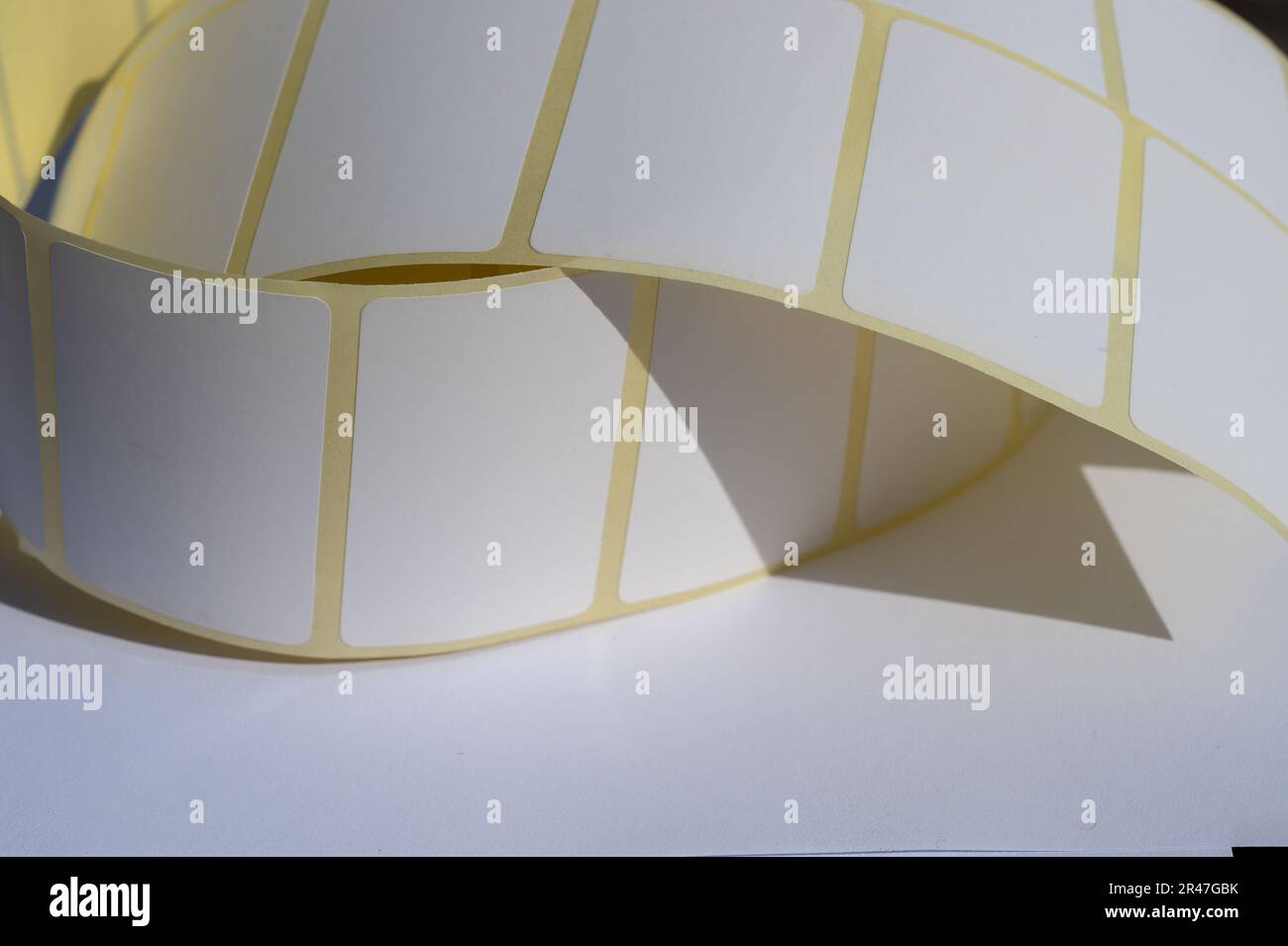 Rolls of white labels isolated. Labels for direct thermal or thermal ...