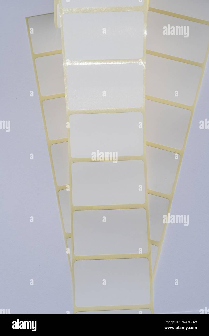 Rolls of white labels isolated. Labels for direct thermal or thermal ...