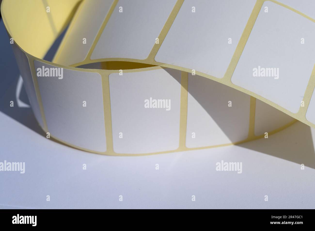 Rolls of white labels isolated. Labels for direct thermal or thermal ...