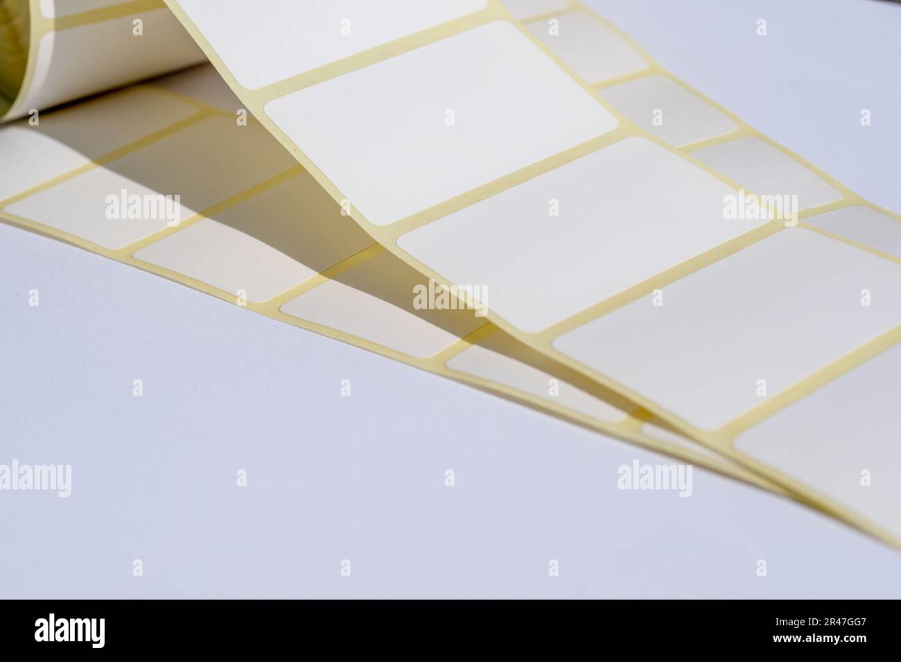 Rolls of white labels isolated. Labels for direct thermal or thermal ...