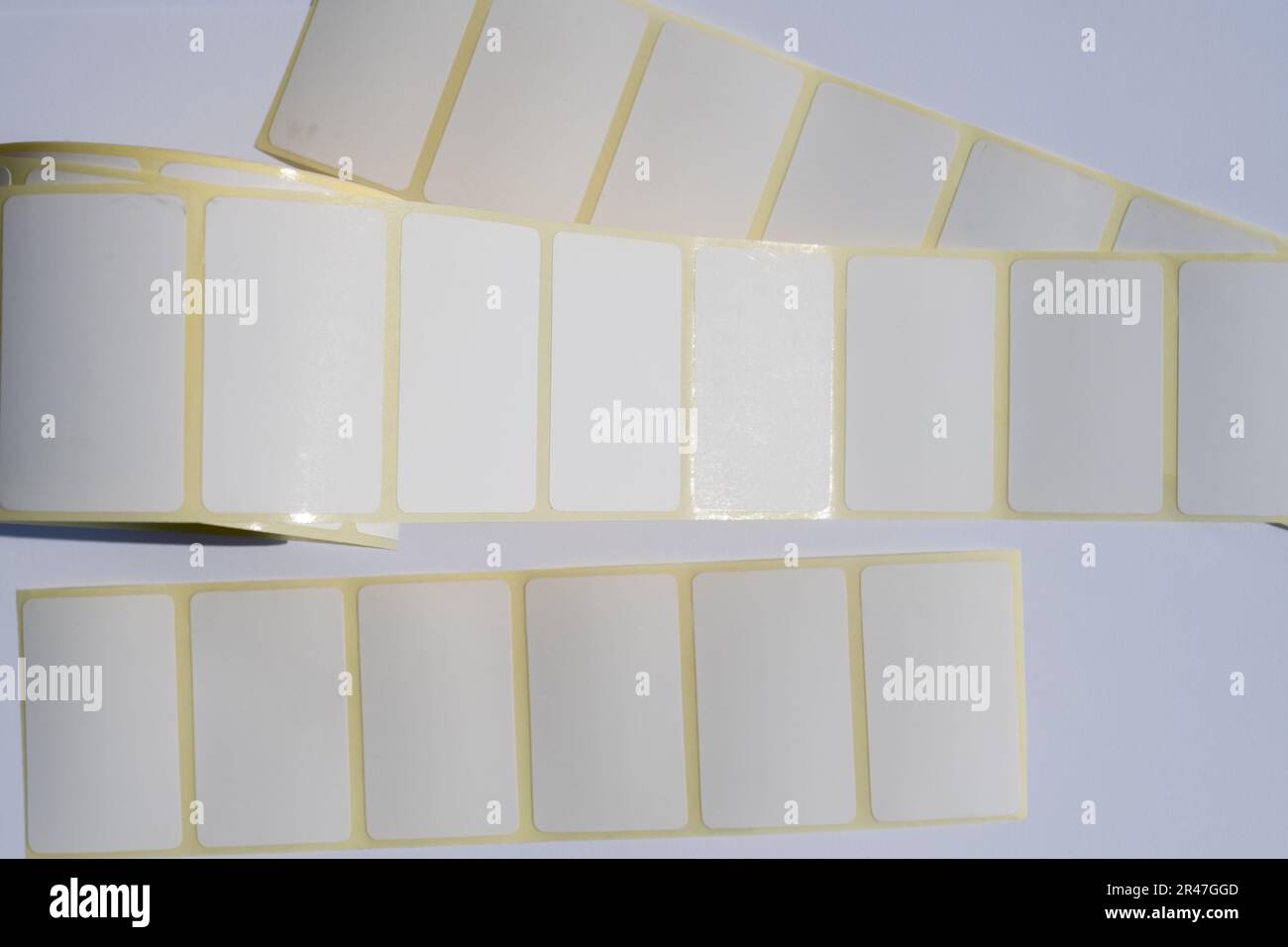 Rolls of white labels isolated. Labels for direct thermal or thermal ...