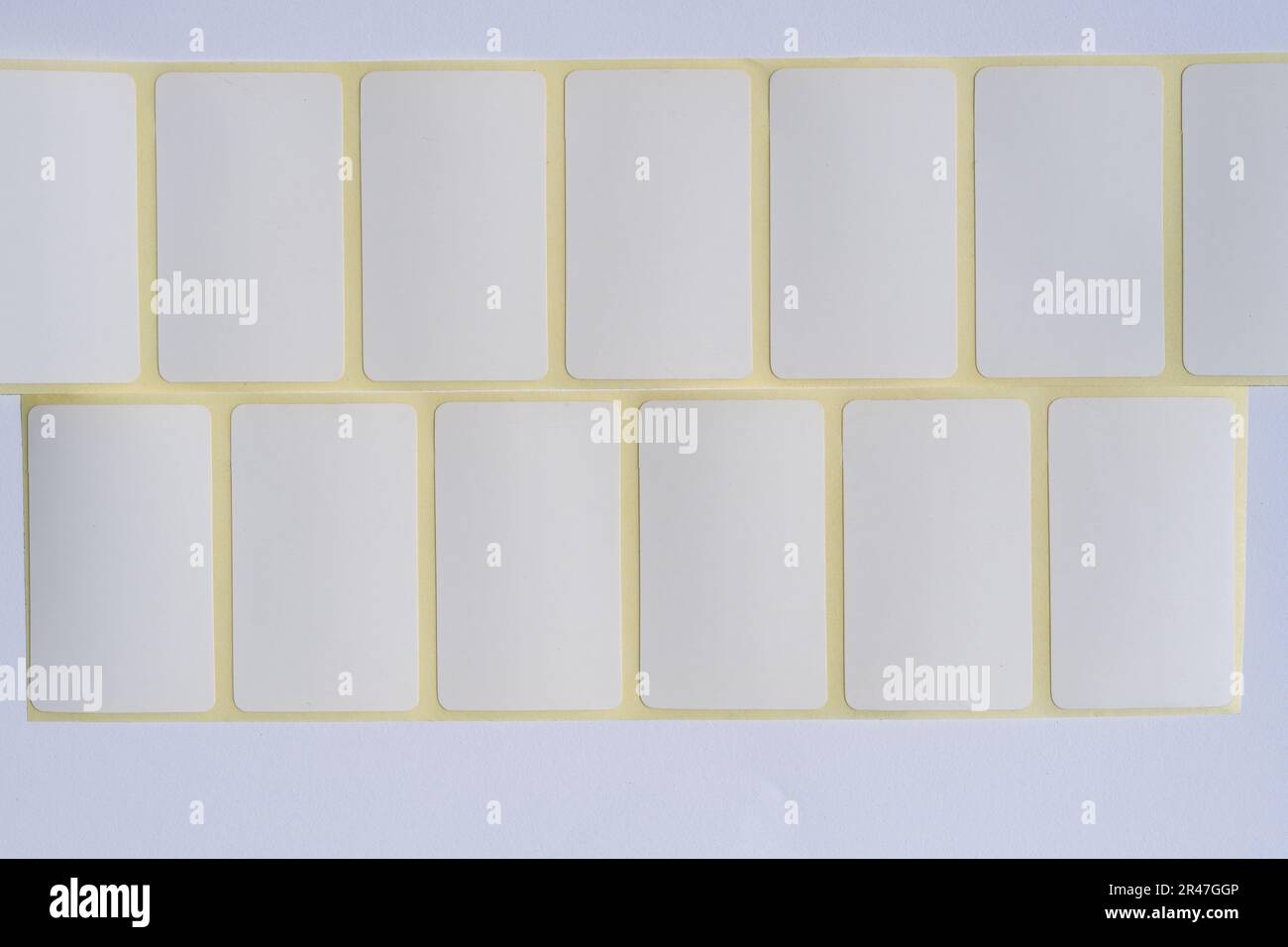 Rolls of white labels isolated. Labels for direct thermal or thermal ...