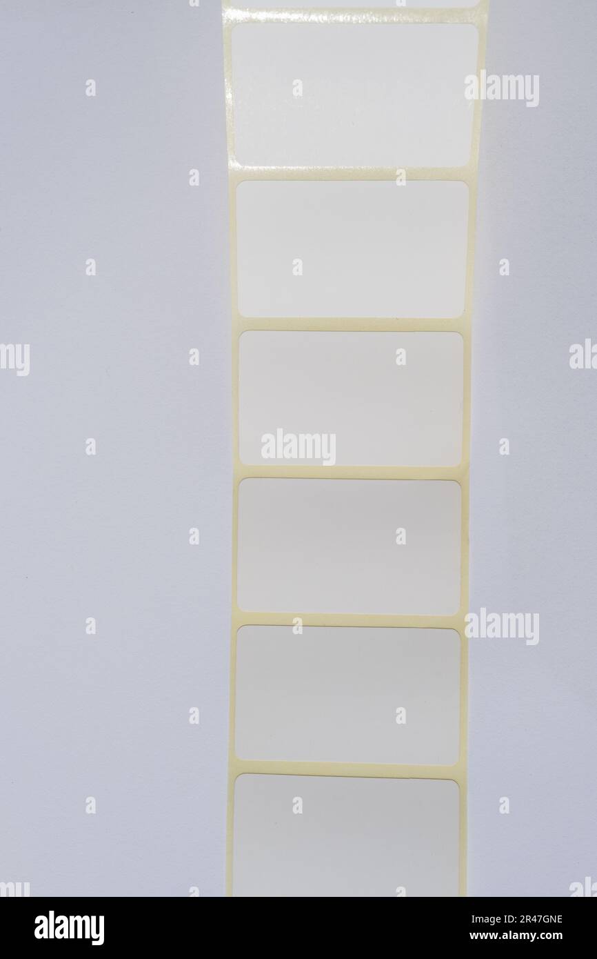 Rolls of white labels isolated. Labels for direct thermal or thermal ...