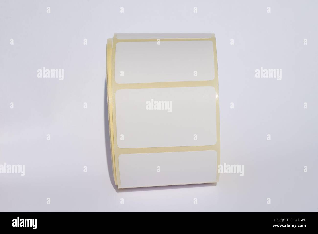 Rolls of white labels isolated. Labels for direct thermal or thermal ...