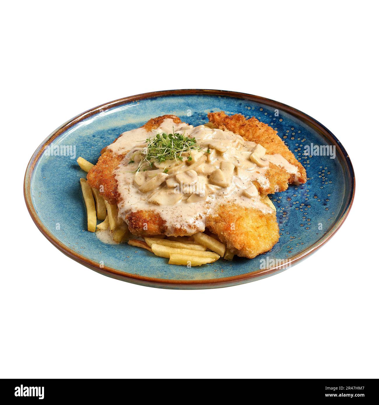 Plate of traditional schnitzel with mushroom sauce and potato on a ...
