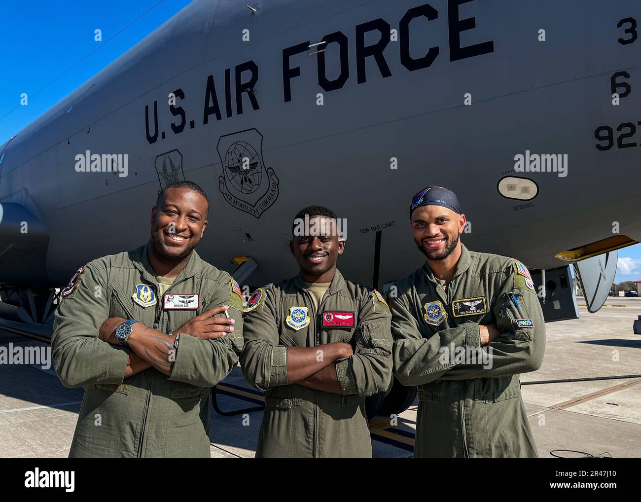 From left to right, U.S. Air Force 2nd Lt. Bryan Lee, a KC-135 ...