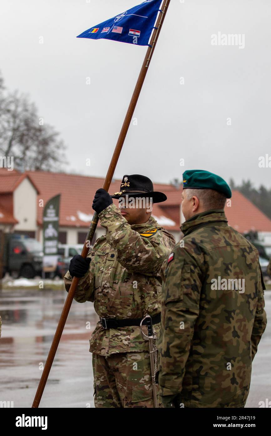 U.S Army Lt. Col. James Ray, left, incoming commander of NATO eFP ...