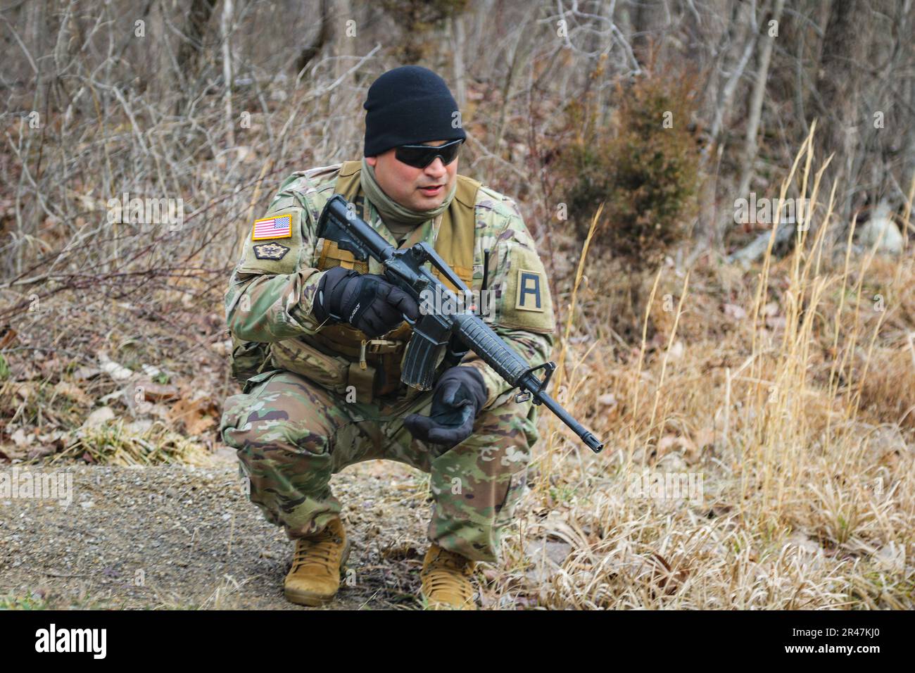 Staff Sgt. Joseph Medina, an Observer, Coach, and Trainer assigned to ...