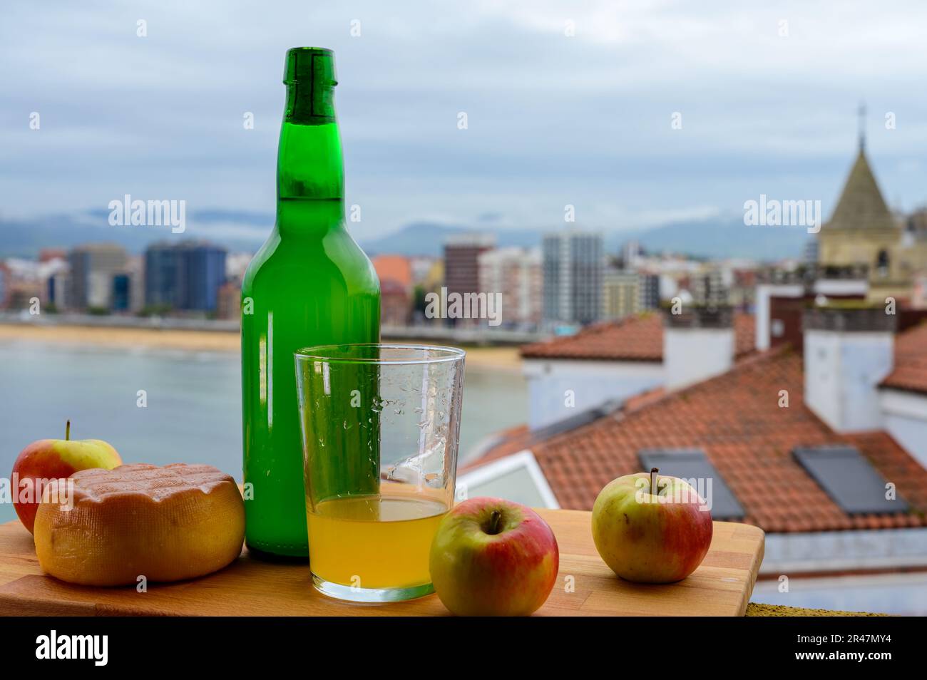 Traditional natural Asturian cider made from fermented apples in wooden ...