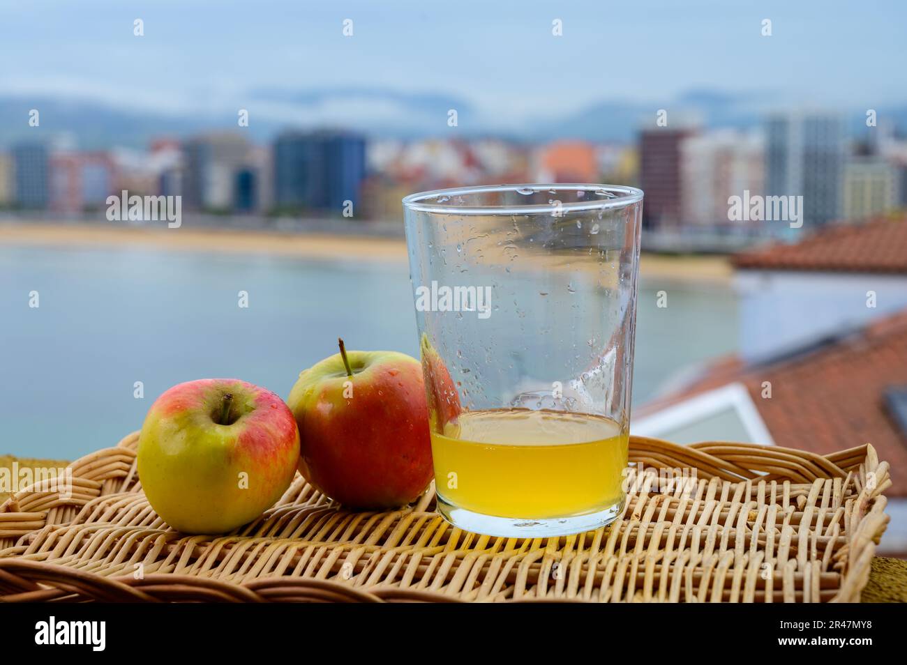 Traditional natural Asturian cider made from fermented apples in wooden ...
