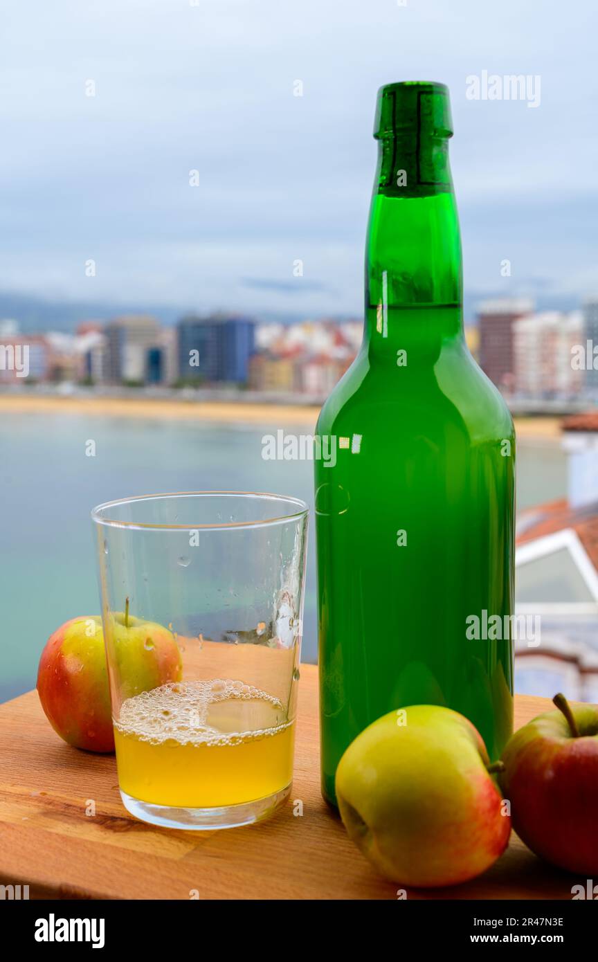 Traditional natural Asturian cider made from fermented apples in wooden ...