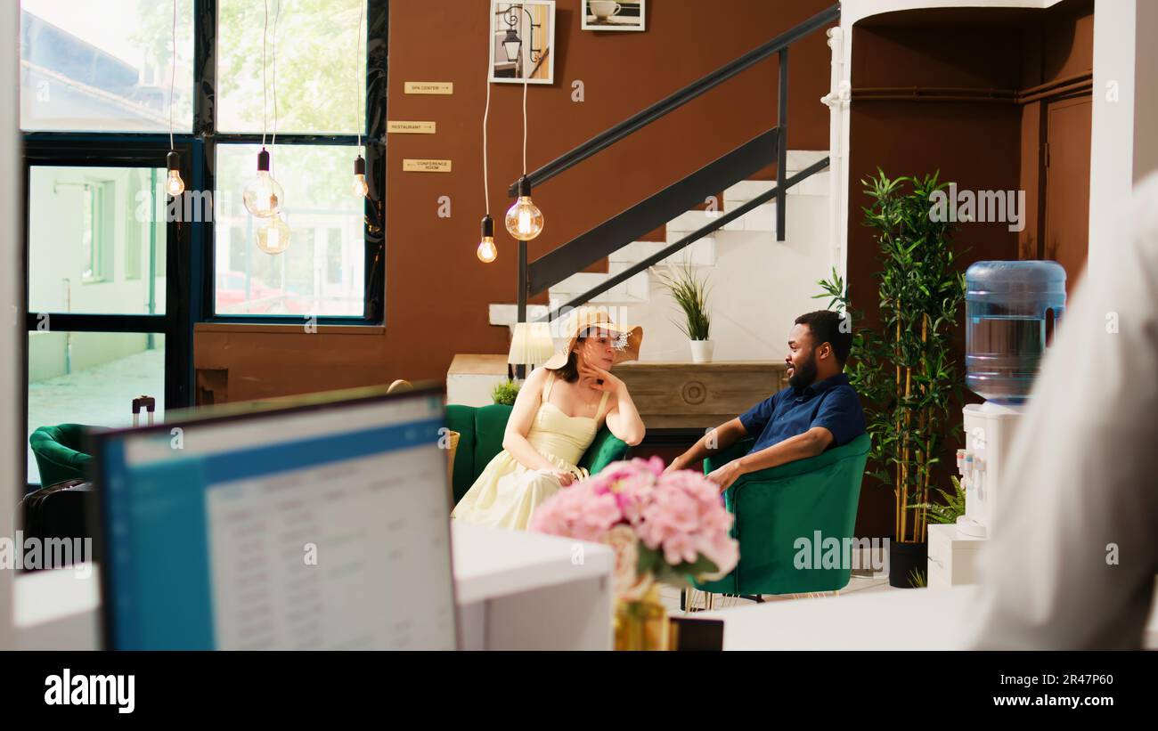 African talking hotel receptionist hi-res stock photography and images ...