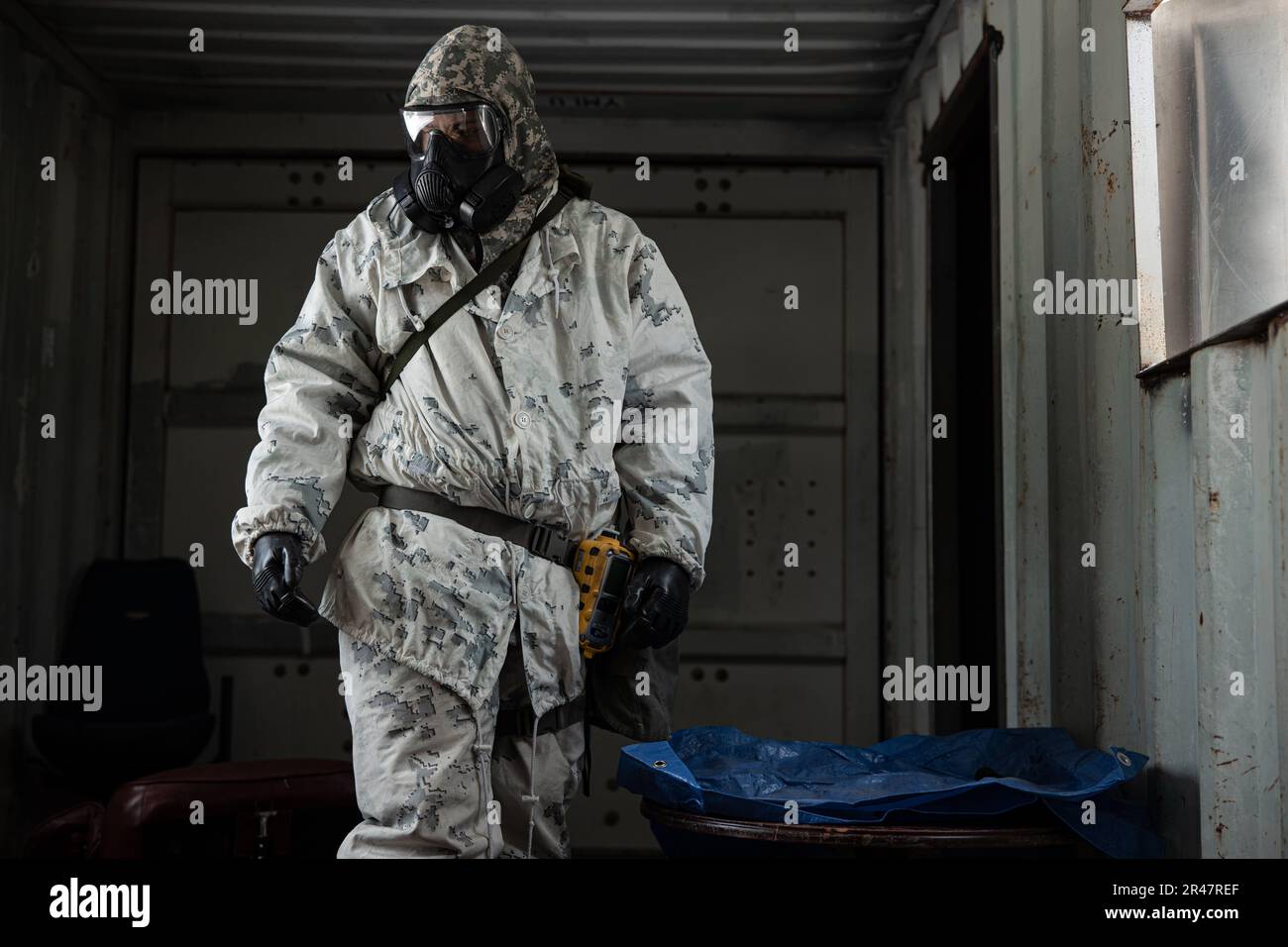 U.S. Marine Corps Cpl. Justin Dickison, a chemical, biological ...