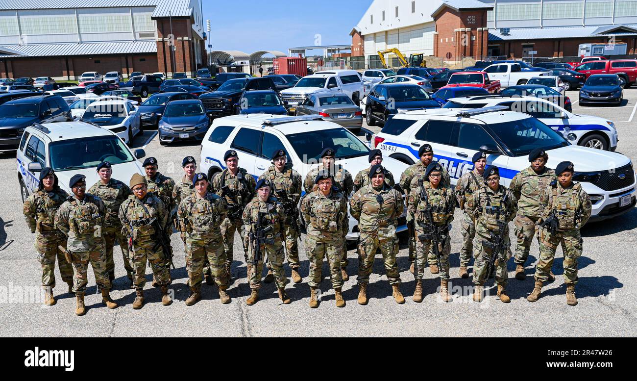 U.S. Airmen with the 633d Security Forces Squadron pose for a group ...