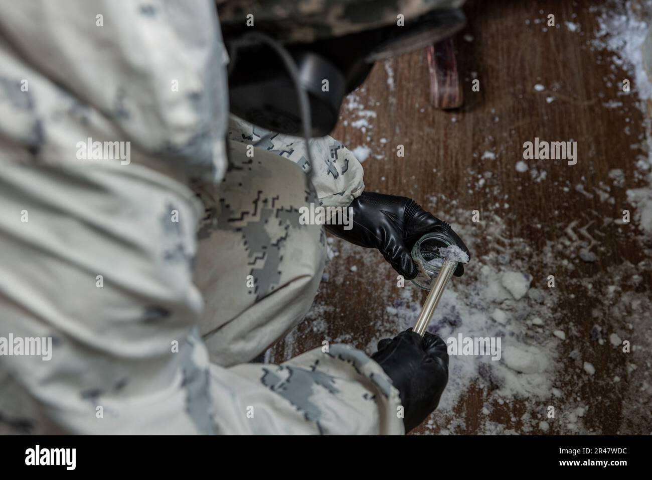 U.S. Marine Corps Cpl. Justin Dickison, a chemical, biological ...
