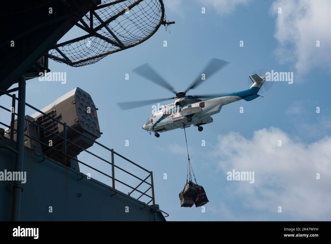 230406-N-WM182-1018 EAST CHINA SEA (April 6, 2023) A helicopter air ...