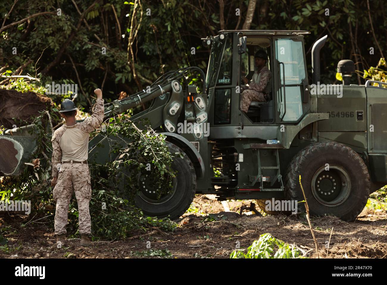 U.S. Marine Corps Cpl. Erik Willis, left, ground guides Lance Cpl ...
