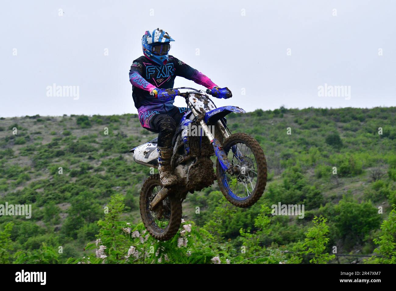 Orman, Macedonia, May 14 2023. In rainy weather and a muddy track ...