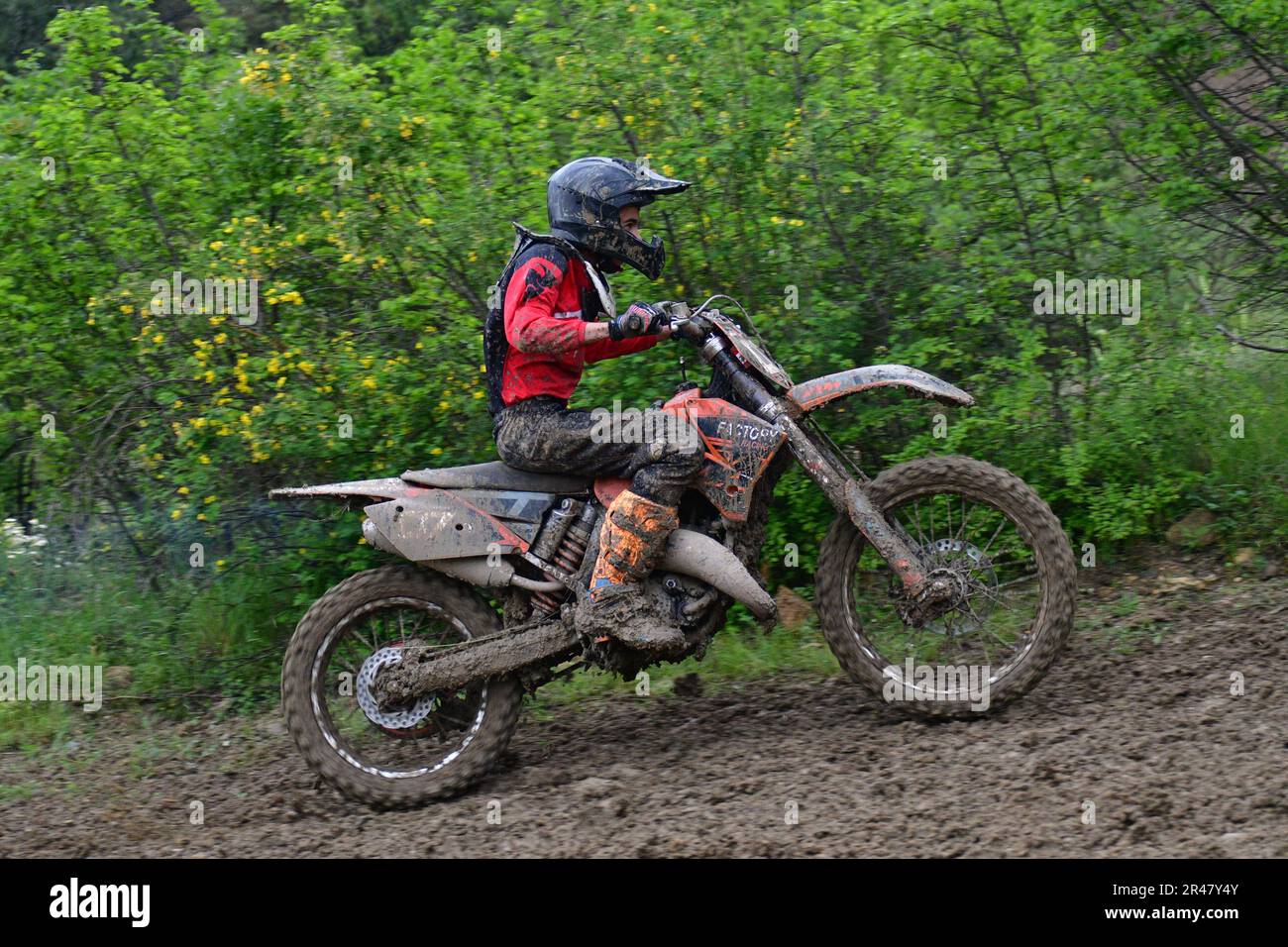 Orman, Macedonia, May 14 2023. In rainy weather and a muddy track ...