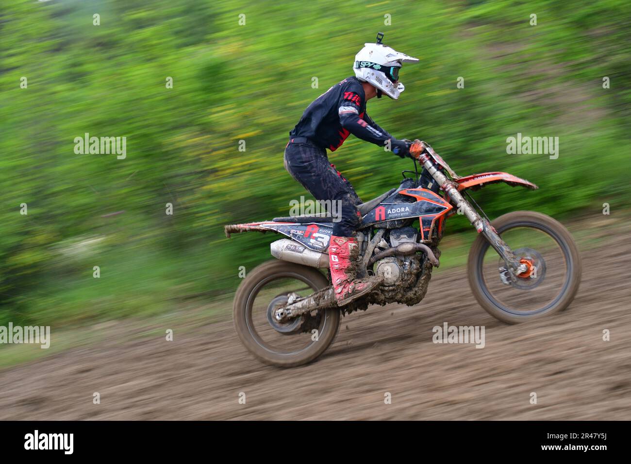 Orman, Macedonia, May 14 2023. In rainy weather and a muddy track ...