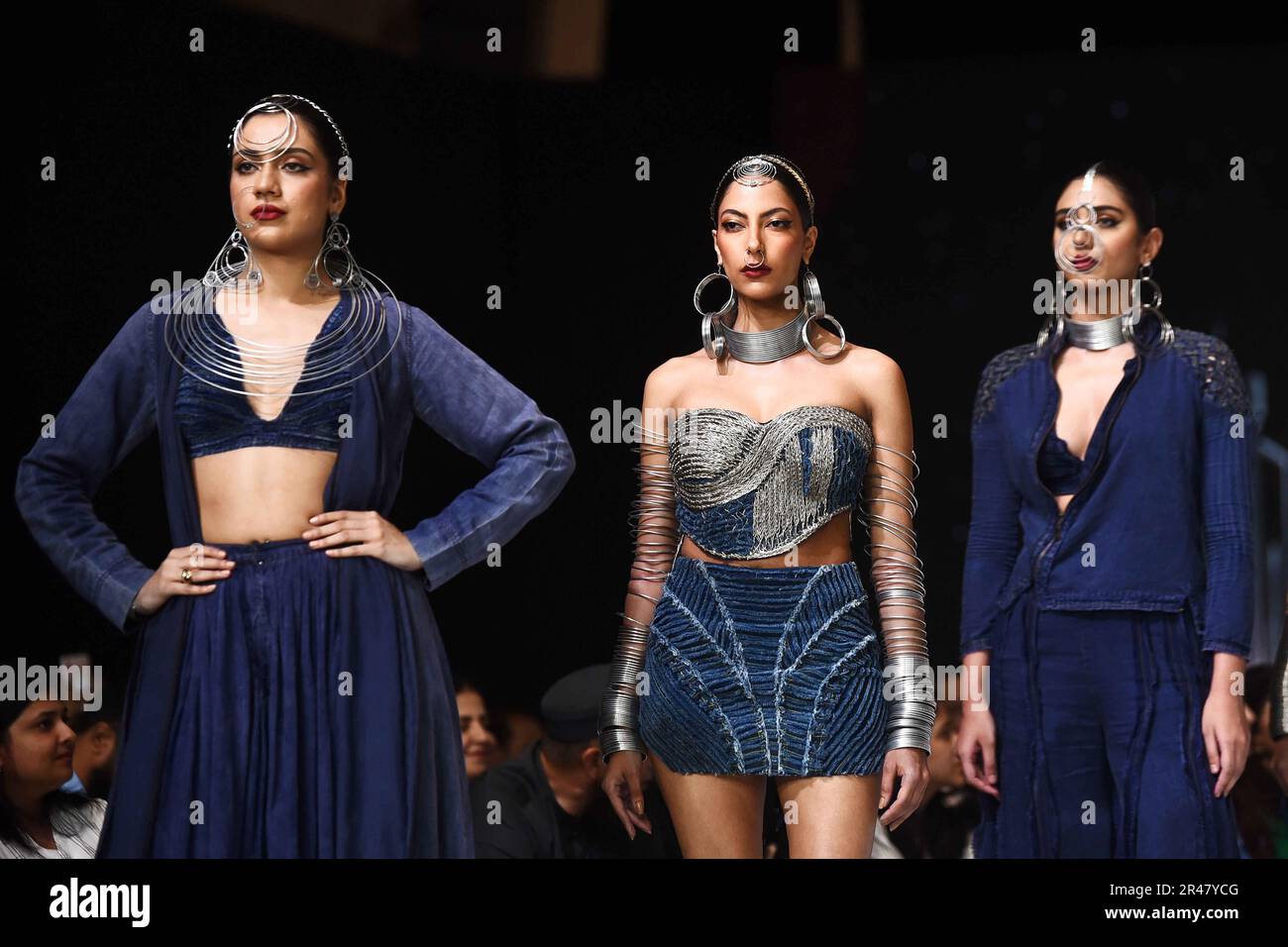 Karachi, Pakistan. 26th May, 2023. Models present creations during a ...