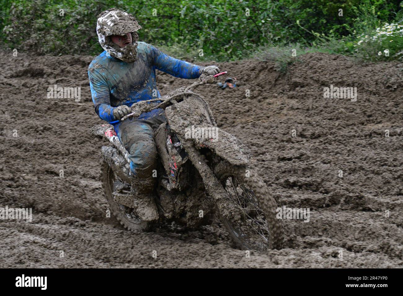 Orman, Macedonia, May 14 2023. In rainy weather and a muddy track ...