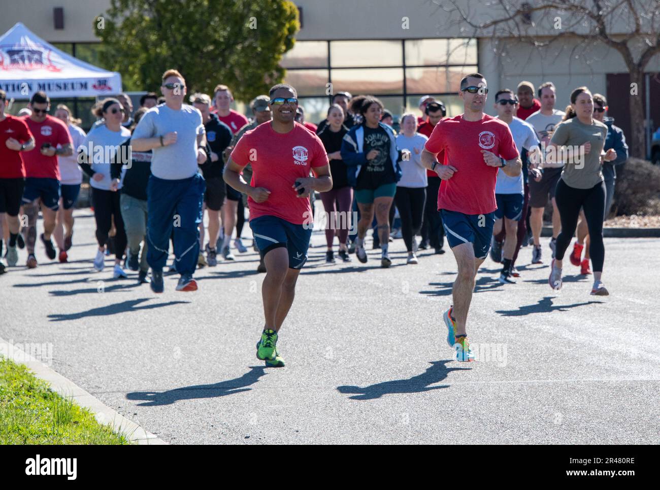 U.S. Airmen and family members participate in a warrior fun run ...