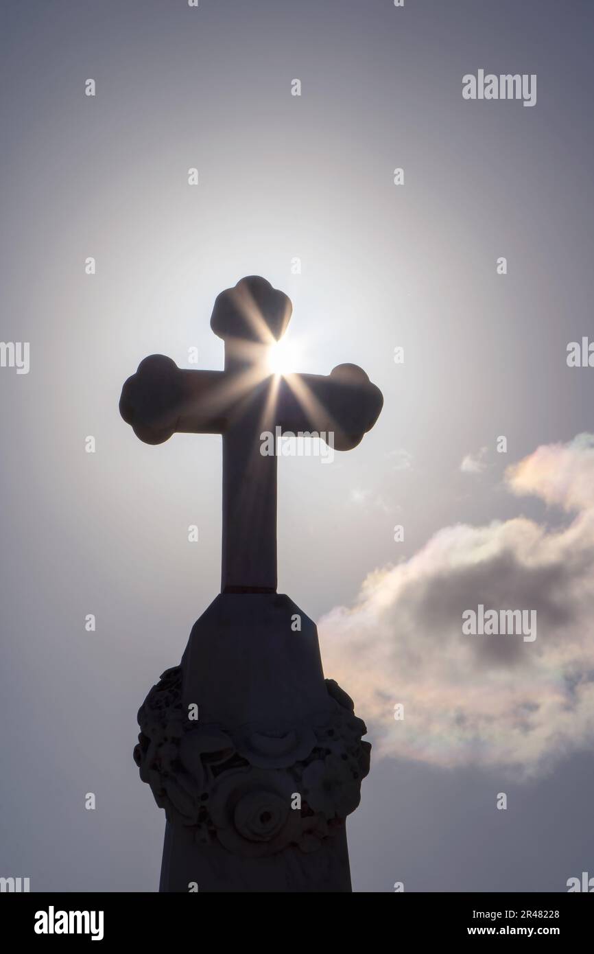 A beautiful outdoor scene featuring a bold and symbolic cross with a ...